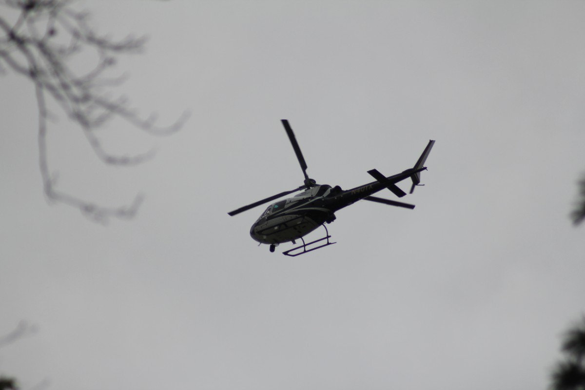 Helicopter hovering over Walden.