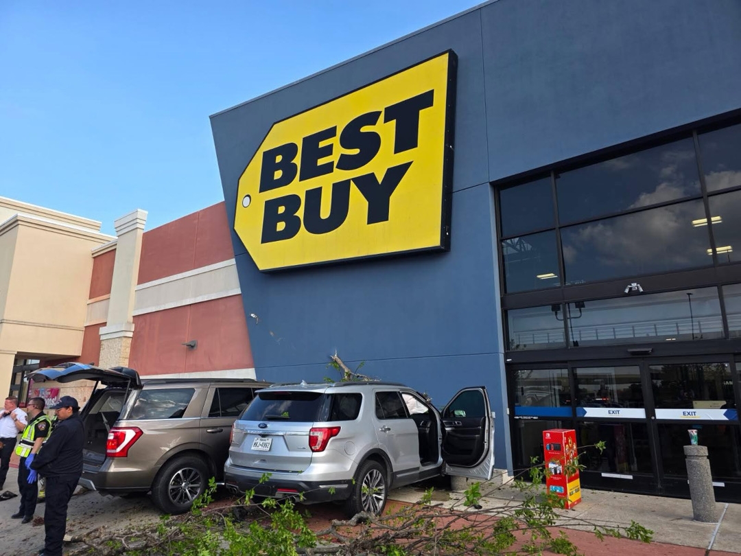 Car vs building. 2 cars into best buy.