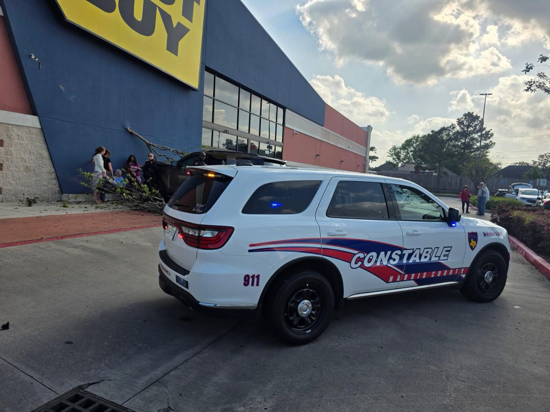 Car vs building. 2 cars into best buy.
